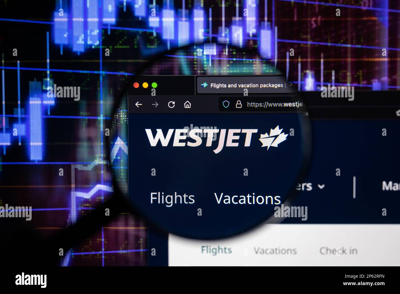 Westjet airline company logo on a website with blurry stock market ...