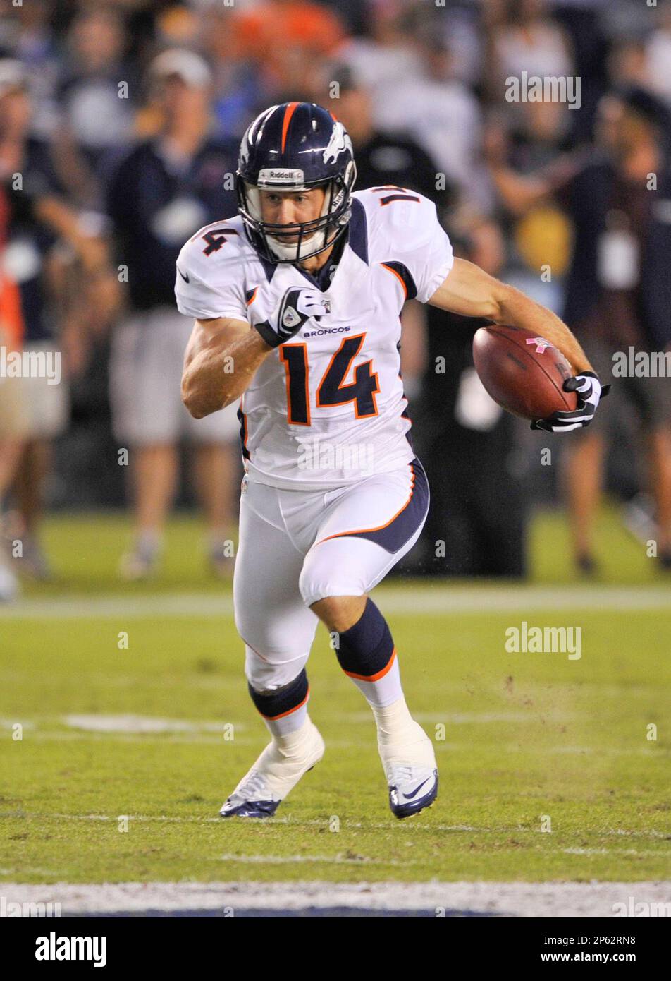 Denver Broncos wide receiver Brandon Stokley (14) heads up field on a ...
