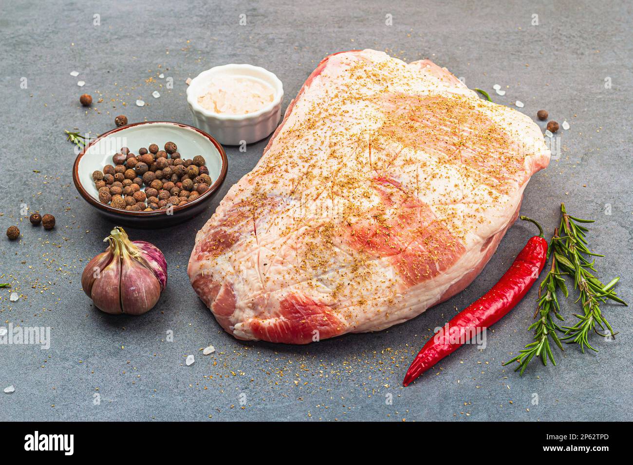 Raw pork shoulder with spices and herbs. Fresh meat cut, ingredient for ...