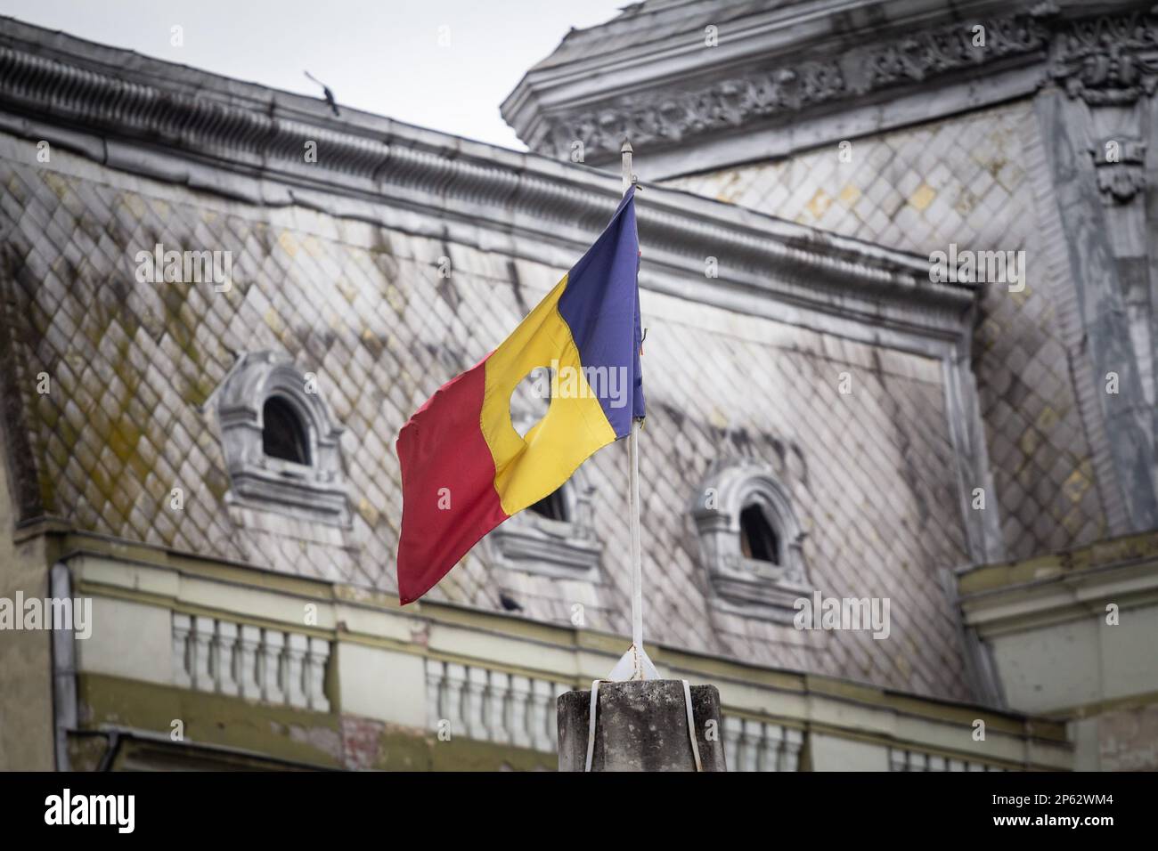 Picture of a Romanian flag flying in the air in Timisoara, the capital ...