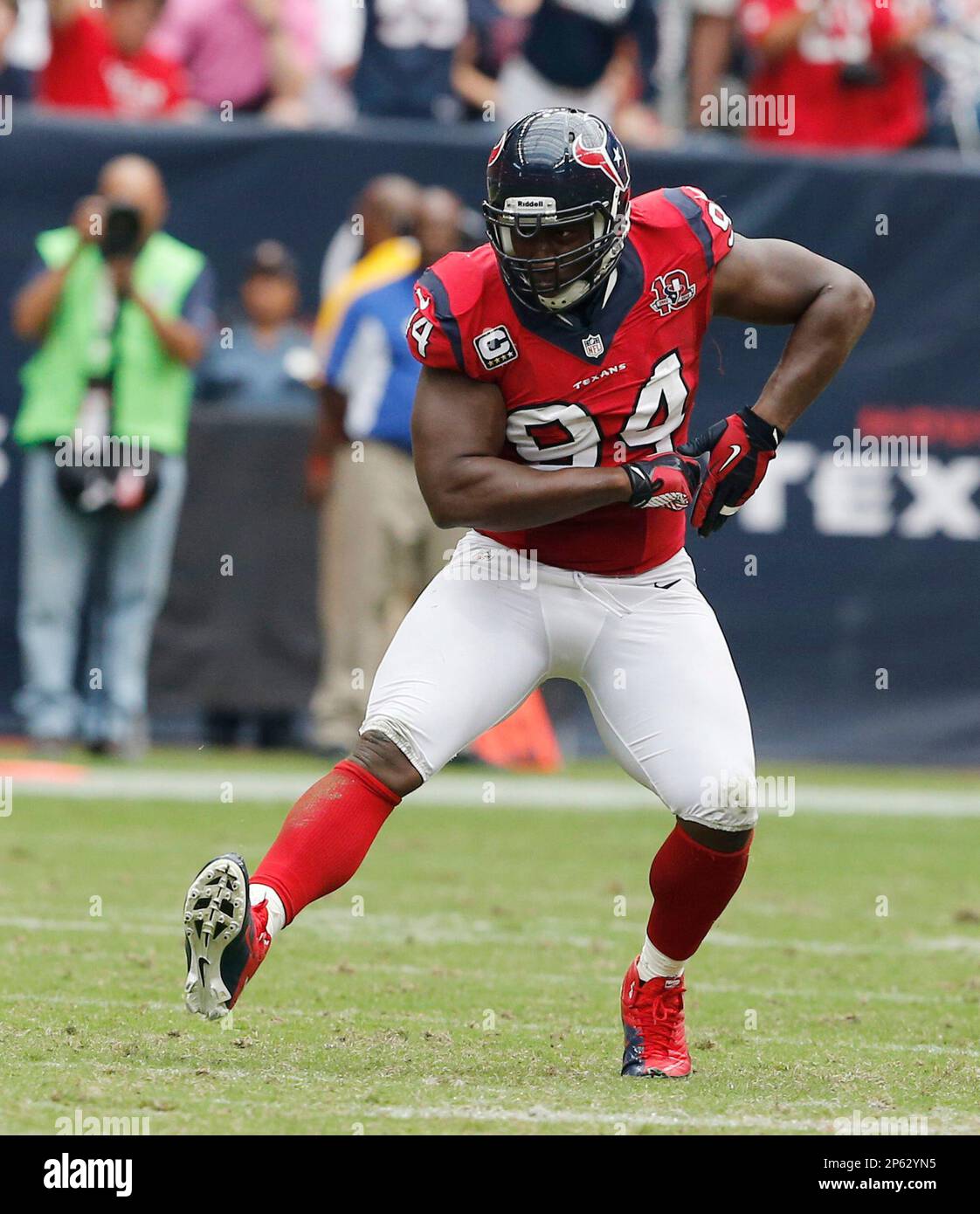 Houston Texans defensive end Antonio Smith (94) celebrates his sack of ...