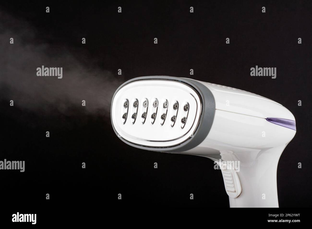 Garment streamer with stream on black background Stock Photo - Alamy