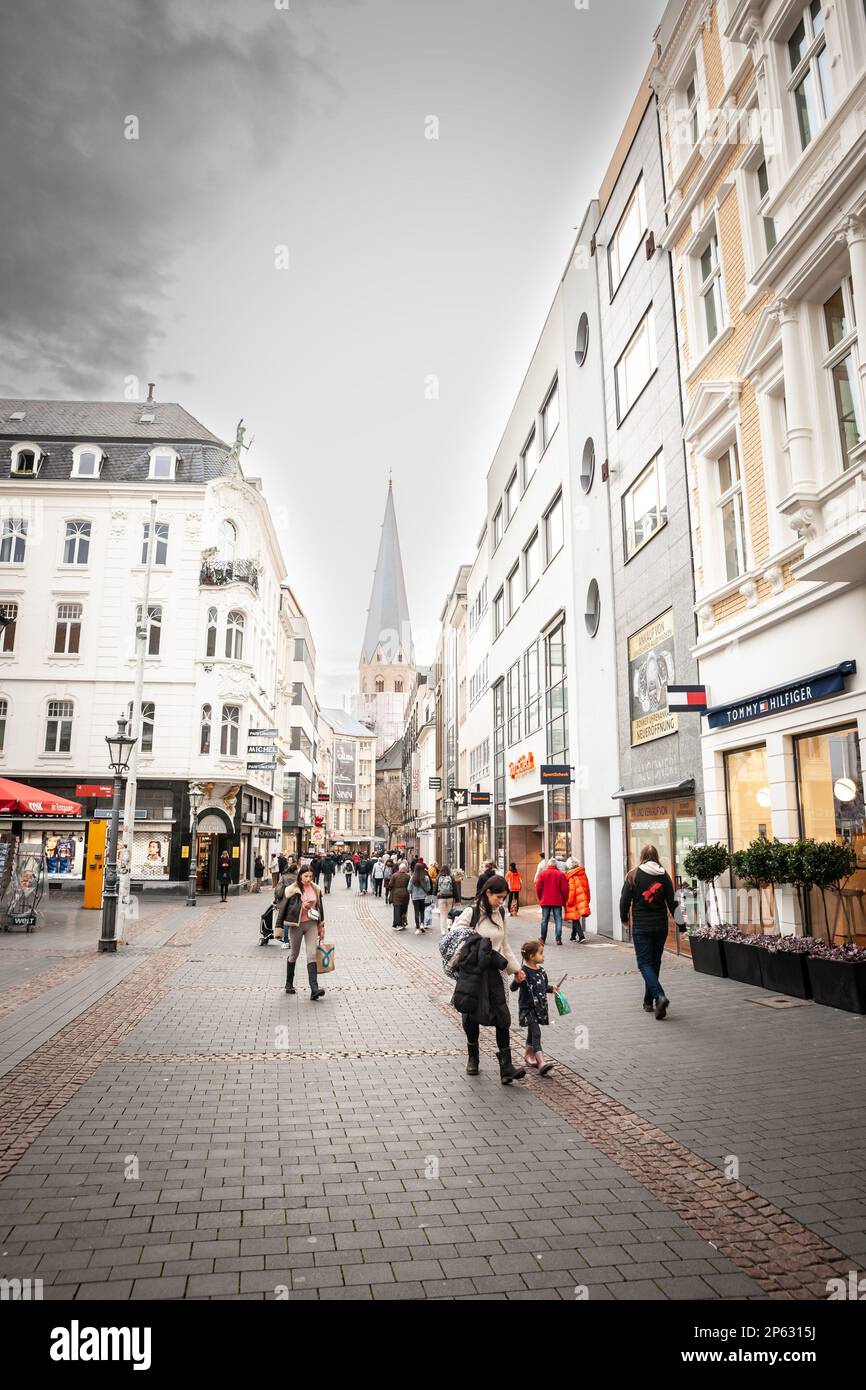 picture of the Remigiusstrasse street with germans walking by stores ...