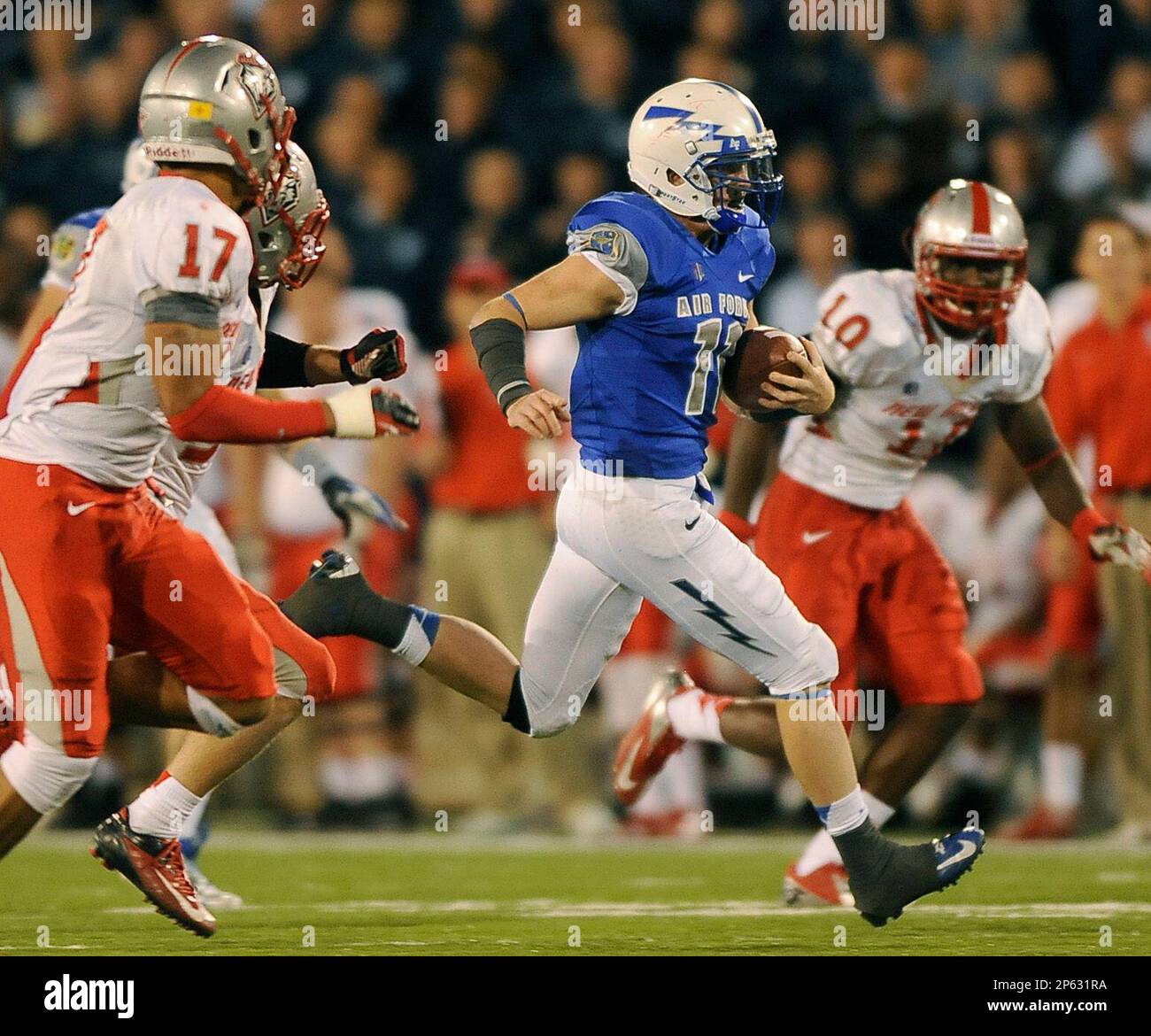 Air Force quarterback Connor Dietz runs past New Mexico's defensive ...
