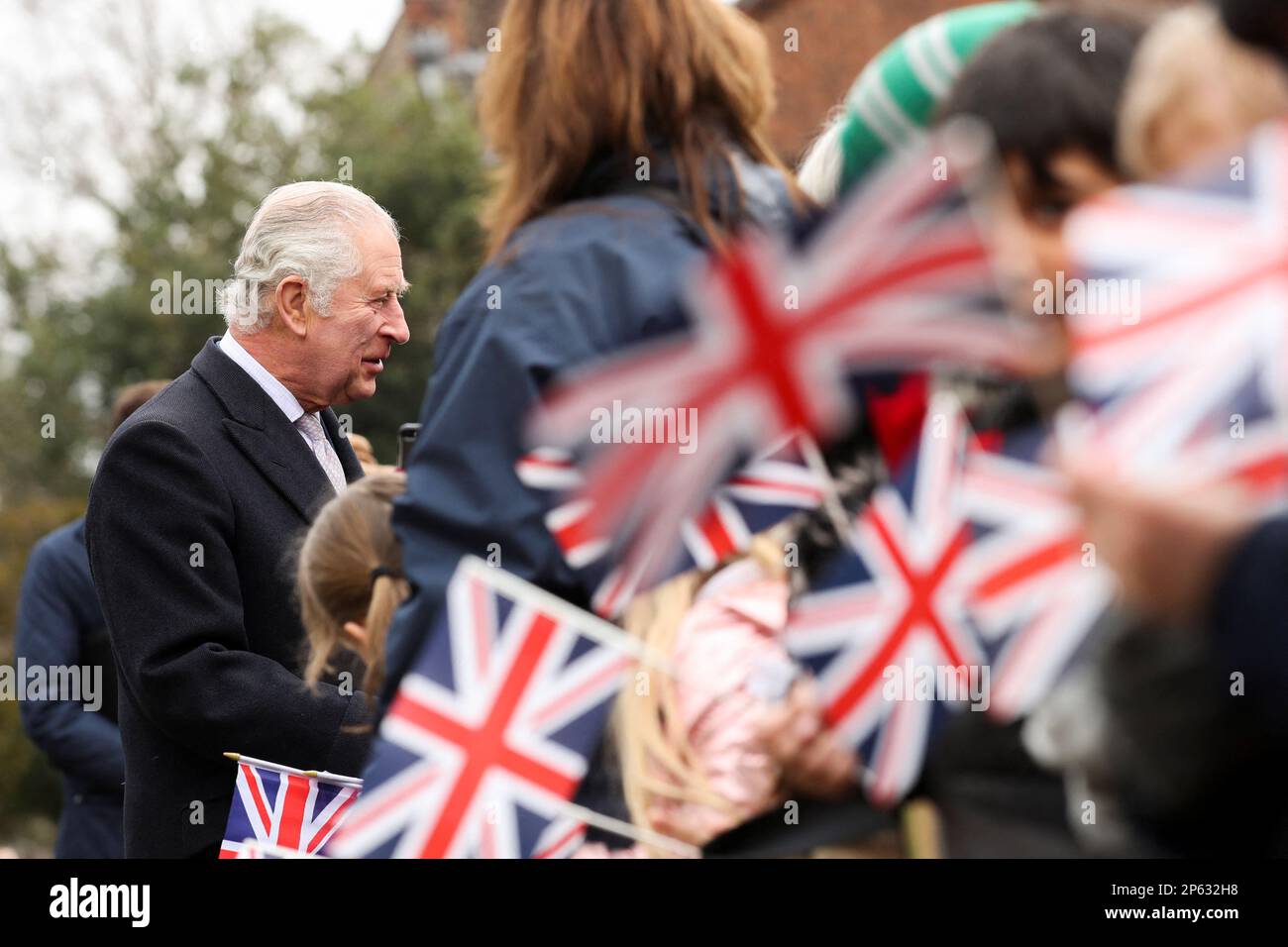 King Charles III speaks to members of the public as he arrives for a ...