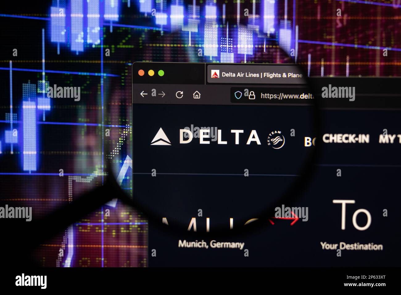 Delta airlines company logo on a website with blurry stock market developments in the background ...