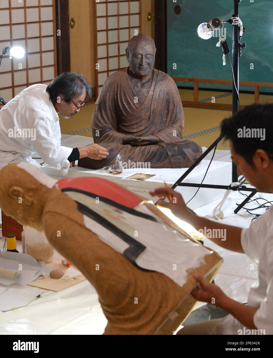 Artists study replicas of a statue of Ganjin Wajo at Toshodaiji temple ...