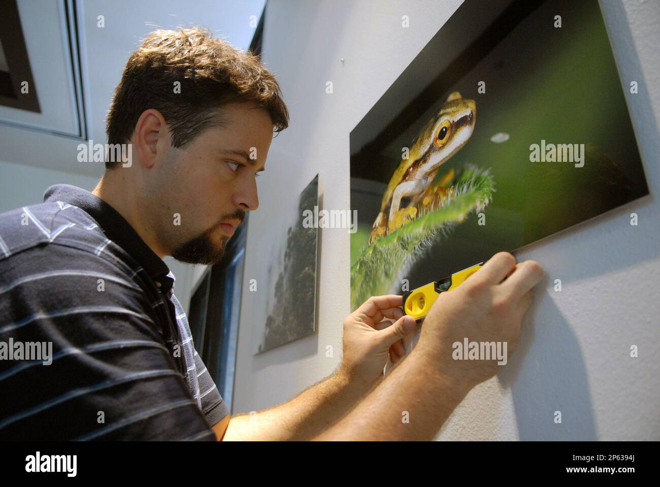 Local photographer Seth Patterson used a level ,Wednesday Oct. 17 to ...