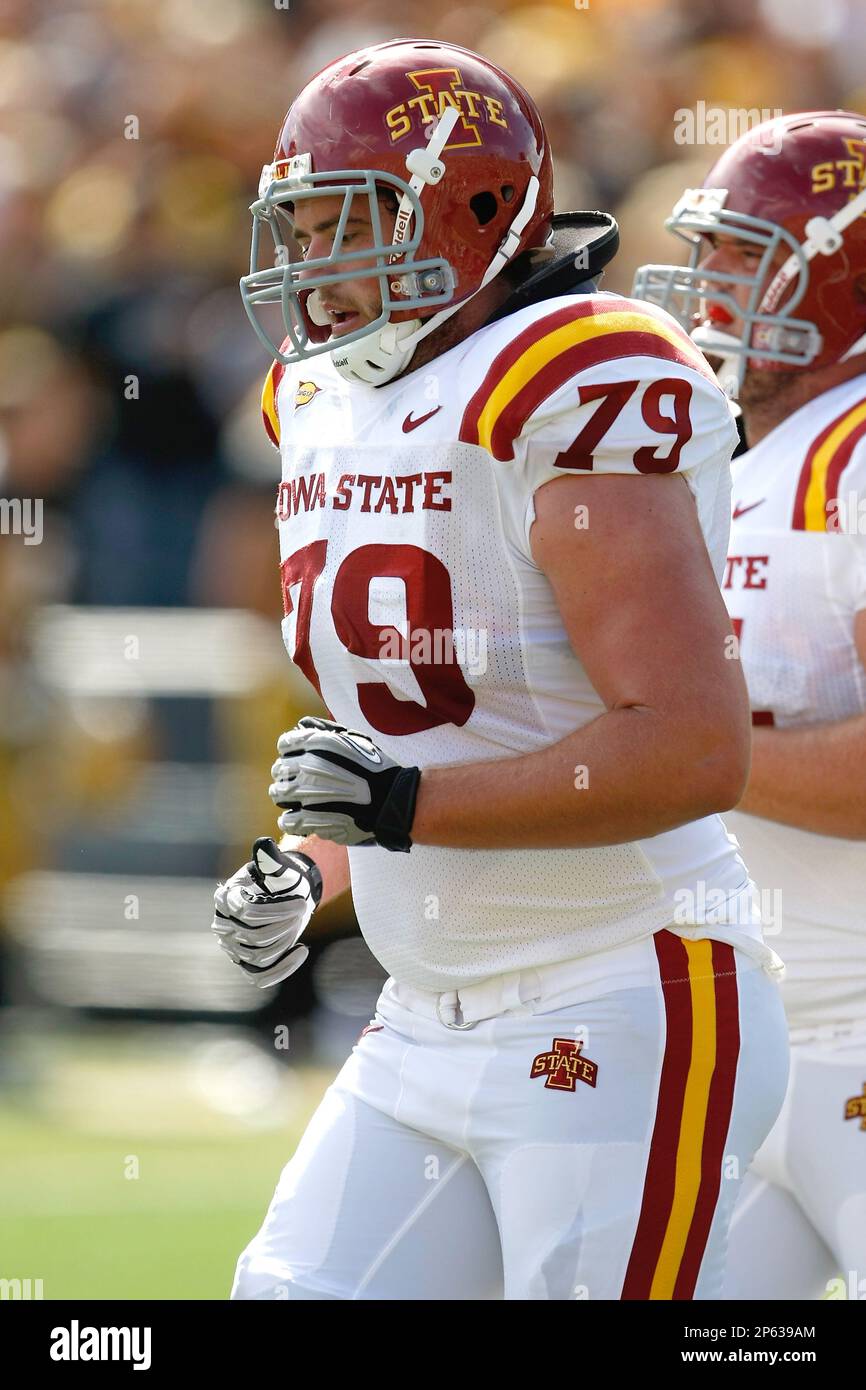 Iowa State offensive lineman Brayden Burris (79) runs in a NCAA college ...