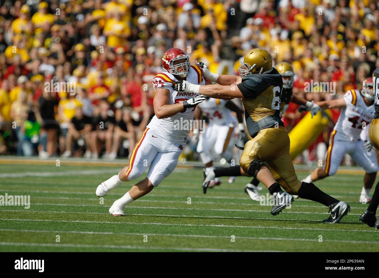 Iowa State defensive lineman Jake McDonough (94) runs in a NCAA college ...