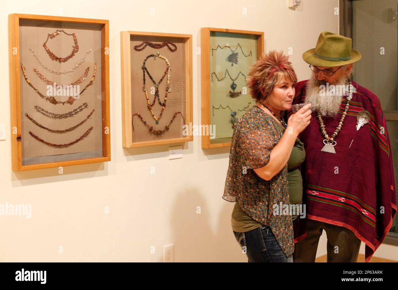 in an oct. 5, 2012 photo, Artist Paul Mergen, right with his daughter ...
