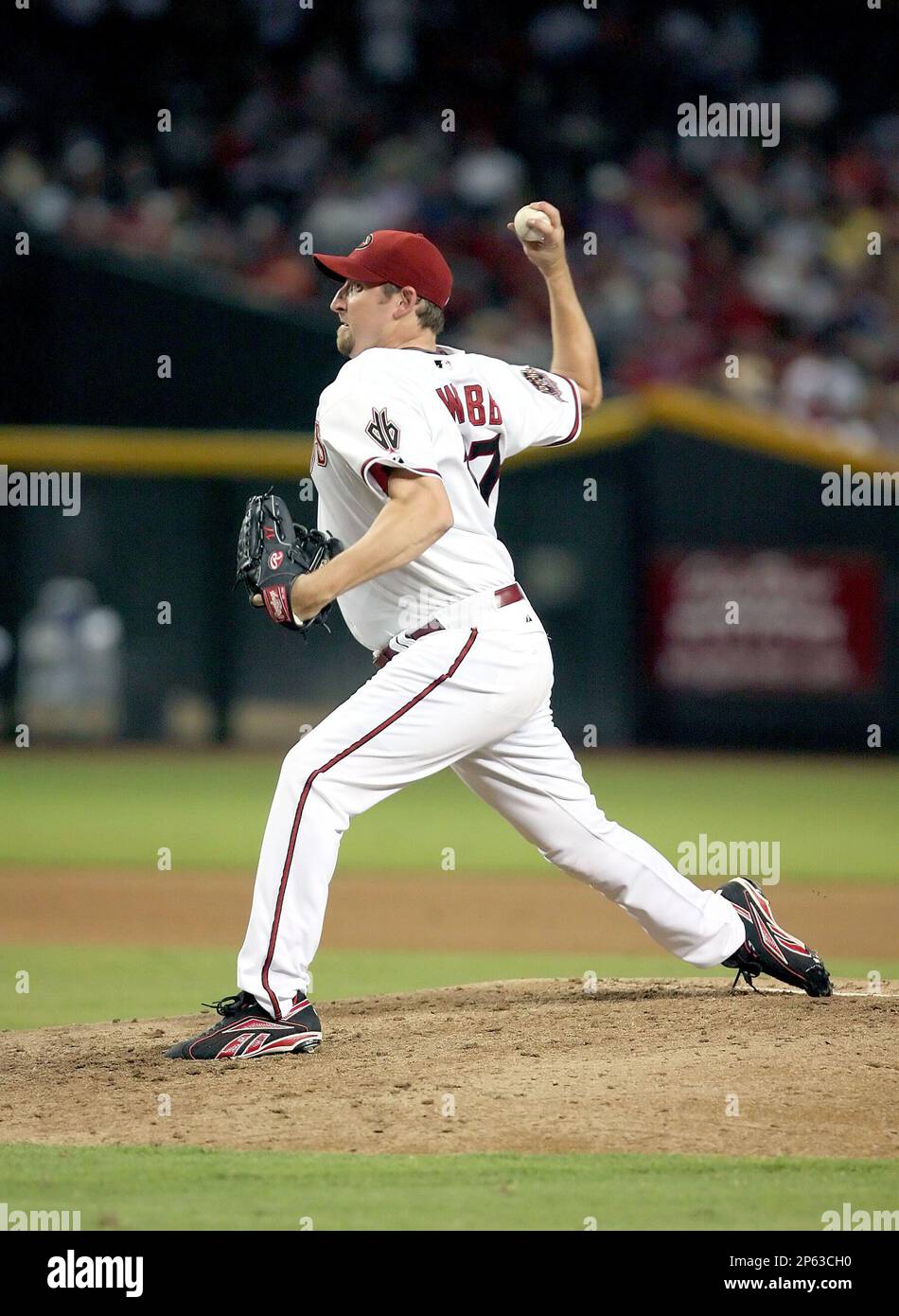 Brandon Webb of the Arizona Diamondbacks pitching against the ...