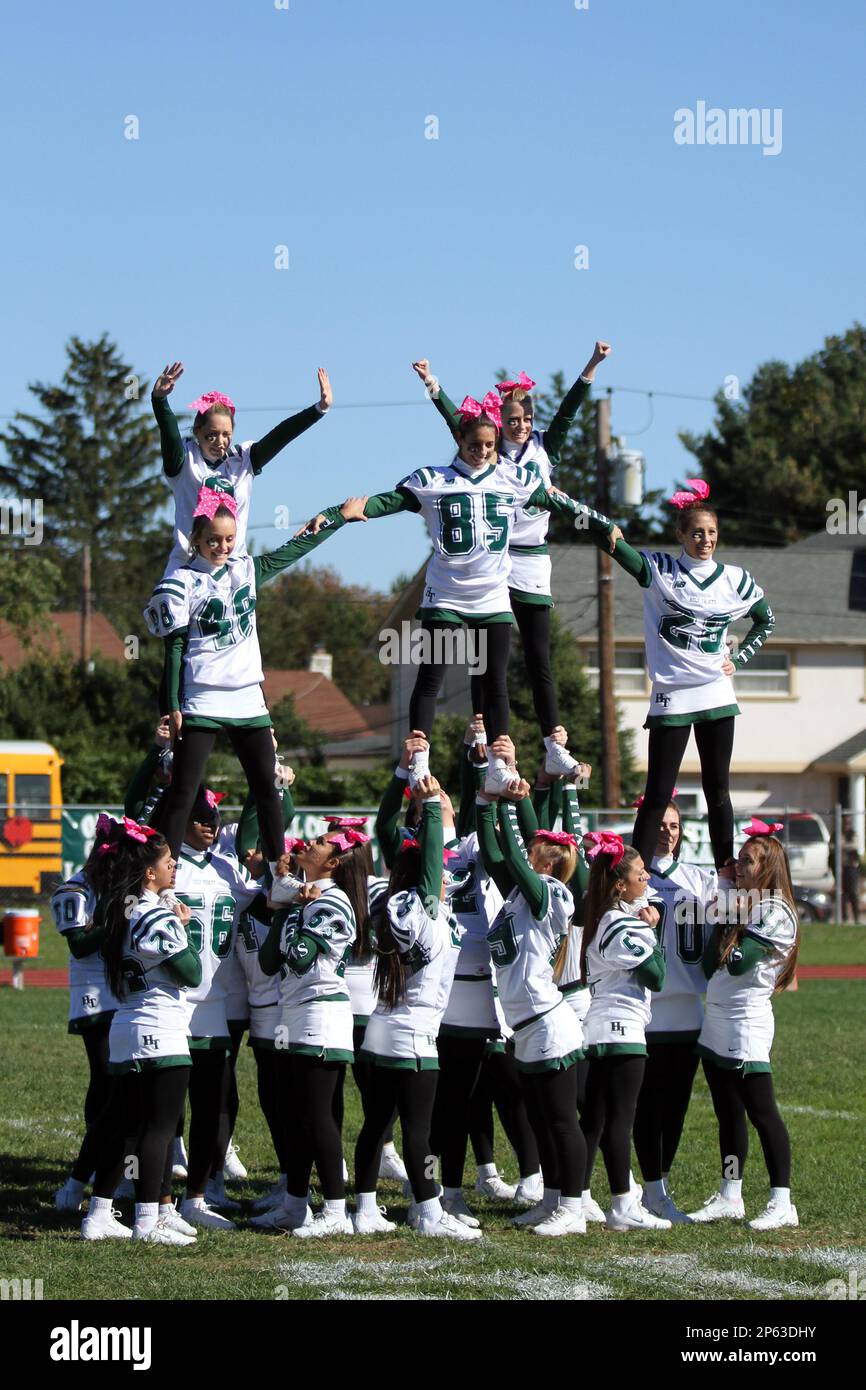 The Holy Trinity Titans cheerleaders are seen during a game against ...