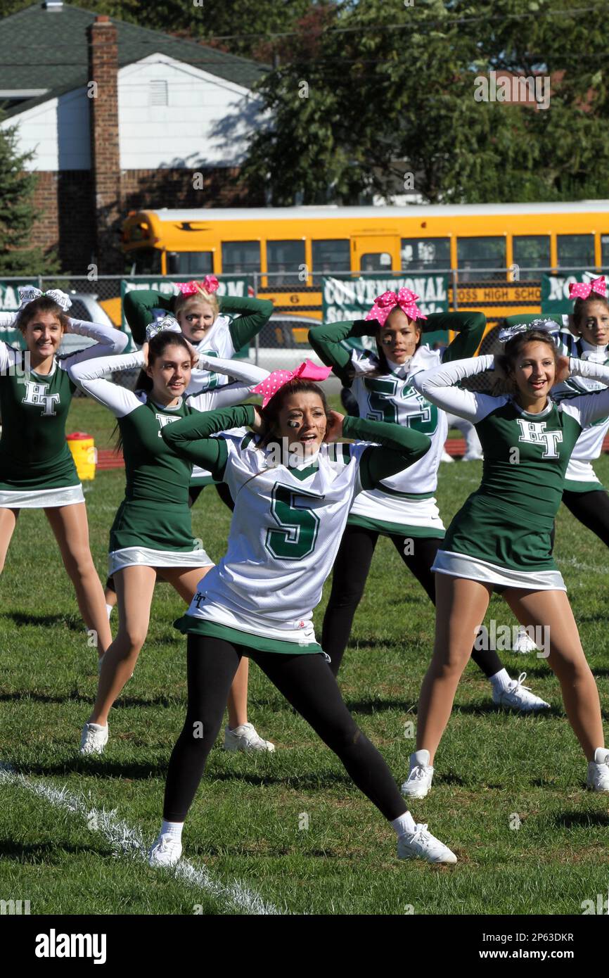 The Holy Trinity Titans cheerleaders and kickline are seen during a ...