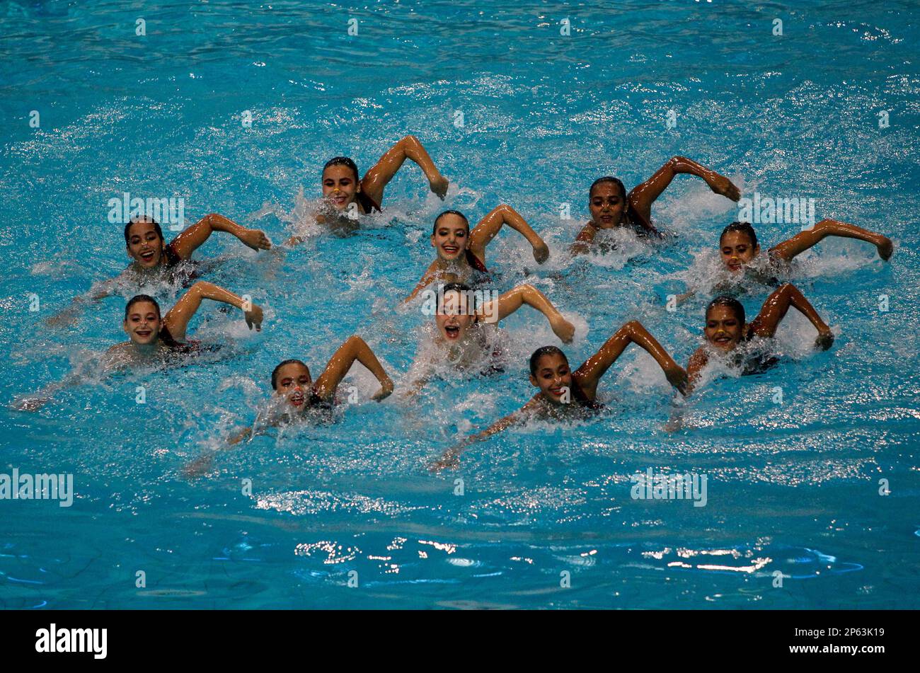 Egyptian swimmers perform the team free combination during the ...