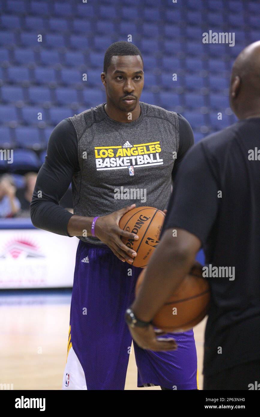 Dwight Howard (12) warms up before the game against the Portland Trail ...