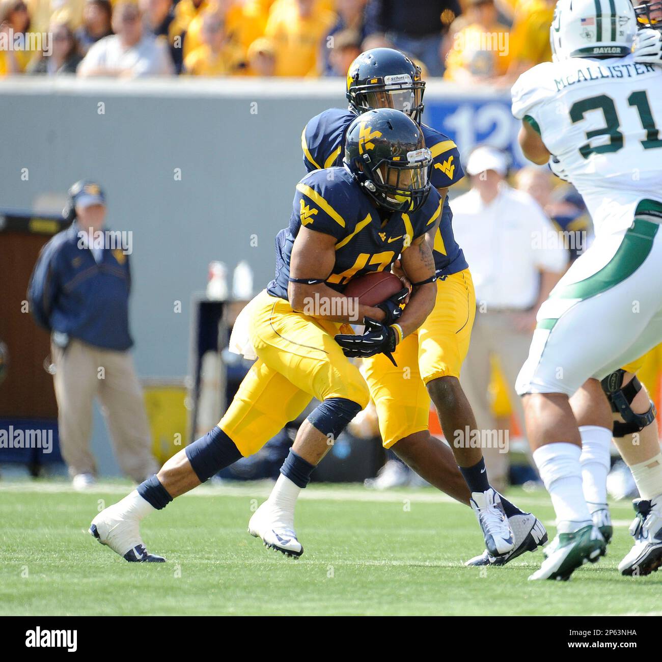 West Virginia Mountaineers Andrew Buie (13) in action during a game ...