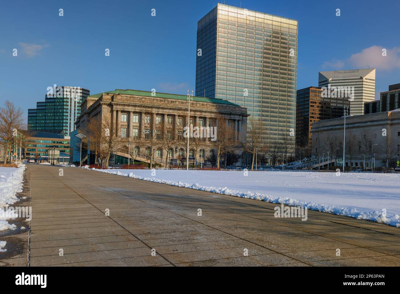 A mixture of architecture is seen from a park block in downtown city of ...