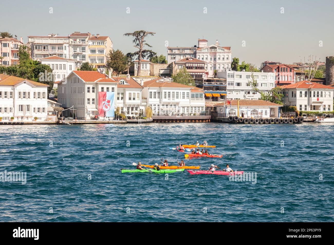 Picture of a group of canoe and kayak cruising on the bosphorus strait ...