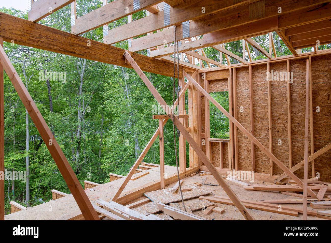 Newly constructed stick wooden beams house is made of timber beams ...