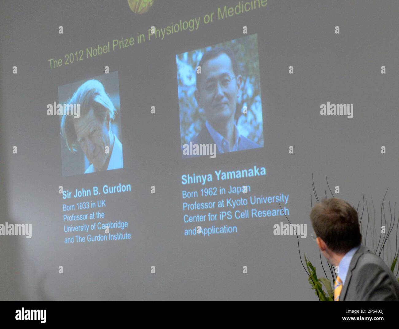 Thomas Perlmann of Karolinska Institute presents Sir John B. Gurdon of ...