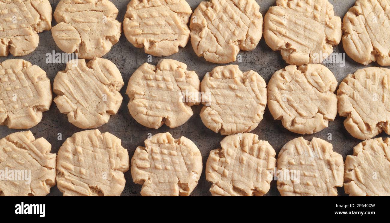 Peanut butter cookies on baking sheet. Wide format shot Stock Photo - Alamy