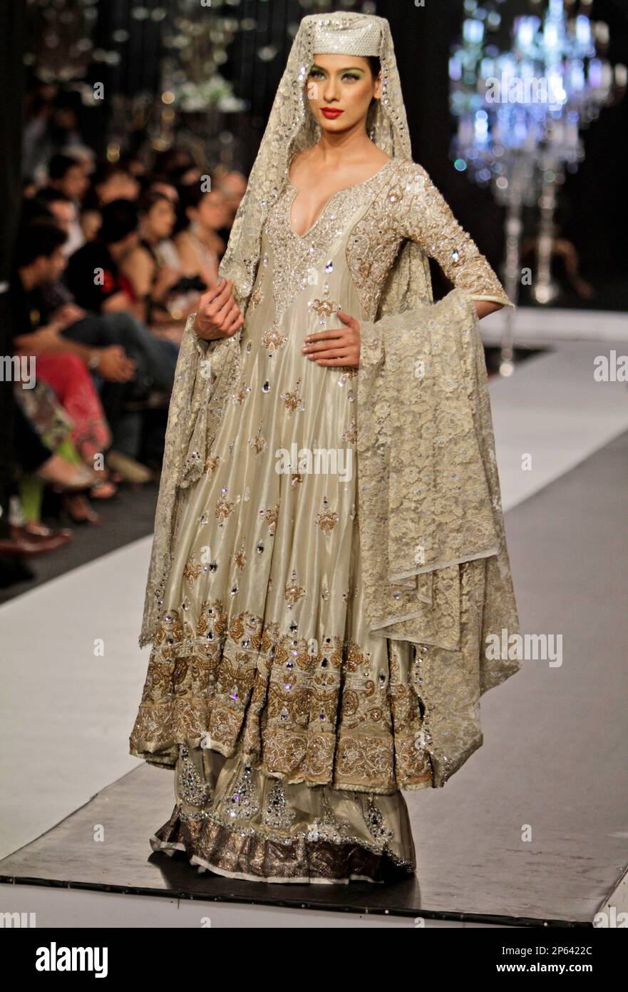 In this Saturday, Oct. 6, 2012 photo, a Pakistani model presents a ...