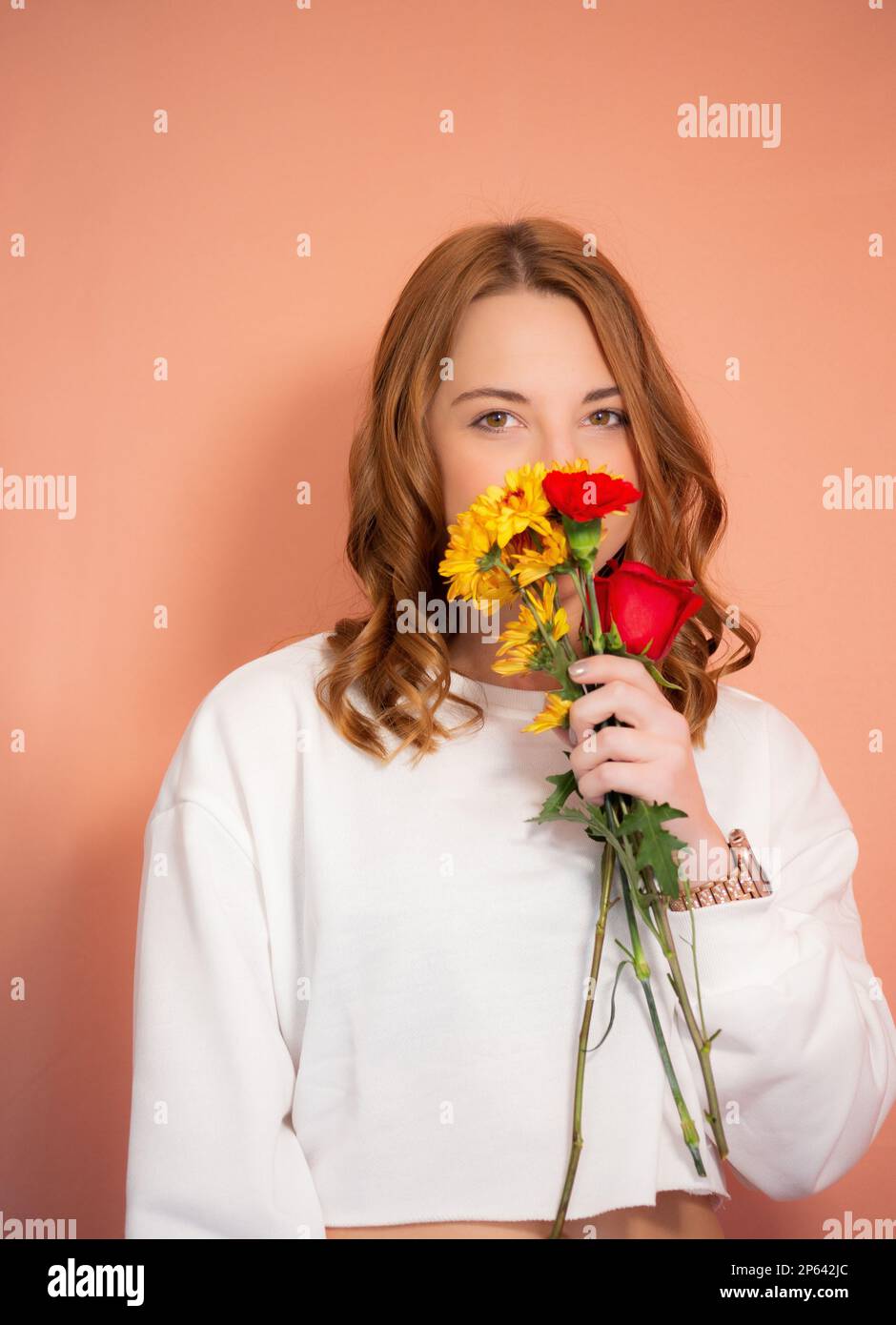Woman Modeling with Flowers Stock Photo - Alamy