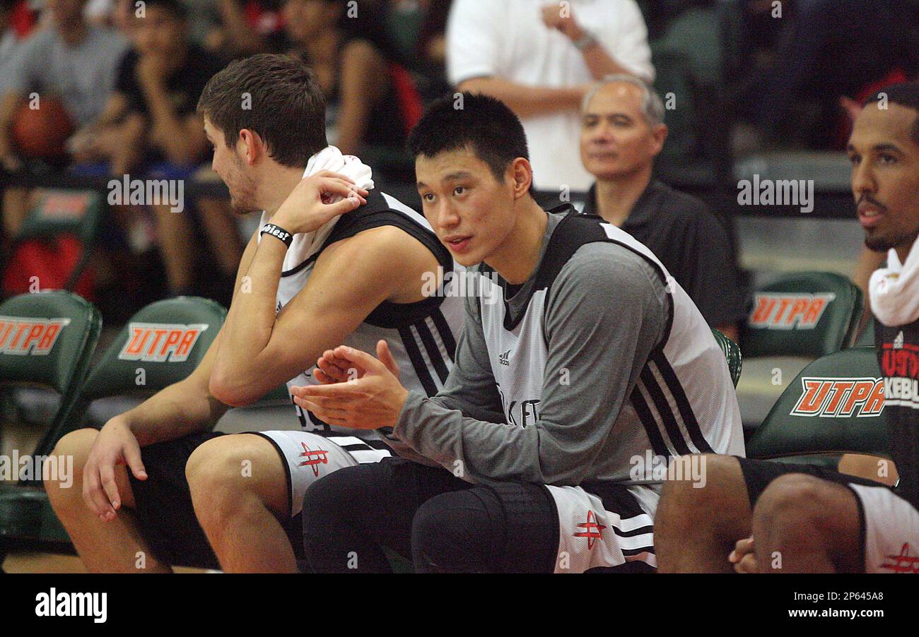 Houston Rockets guard Jeremy Lin applauds his teammates during a inter ...