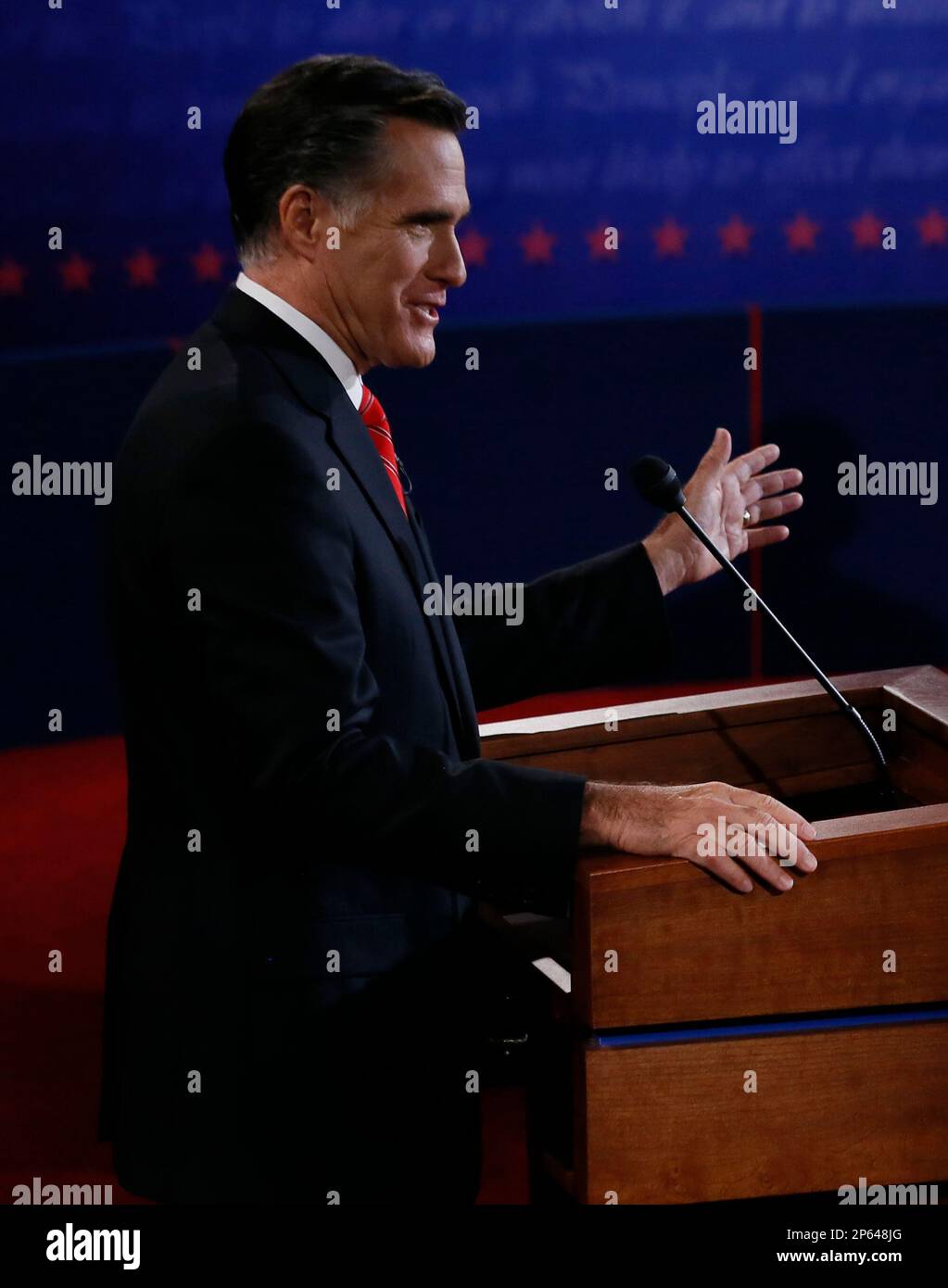 Republican presidential nominee Mitt Romney answers a question during ...