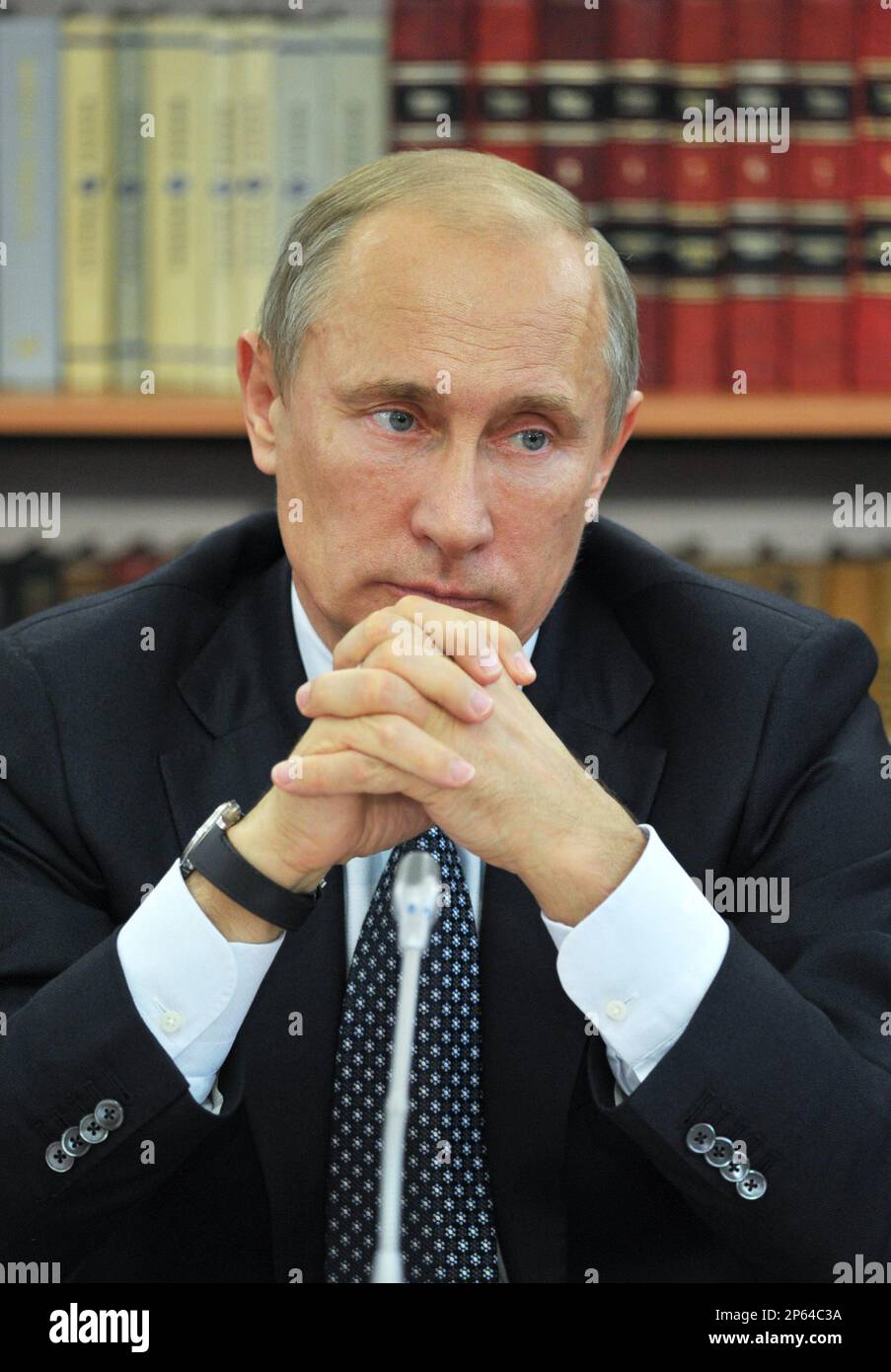Russian President Vladimir Putin meets with elderly people in Moscow on ...