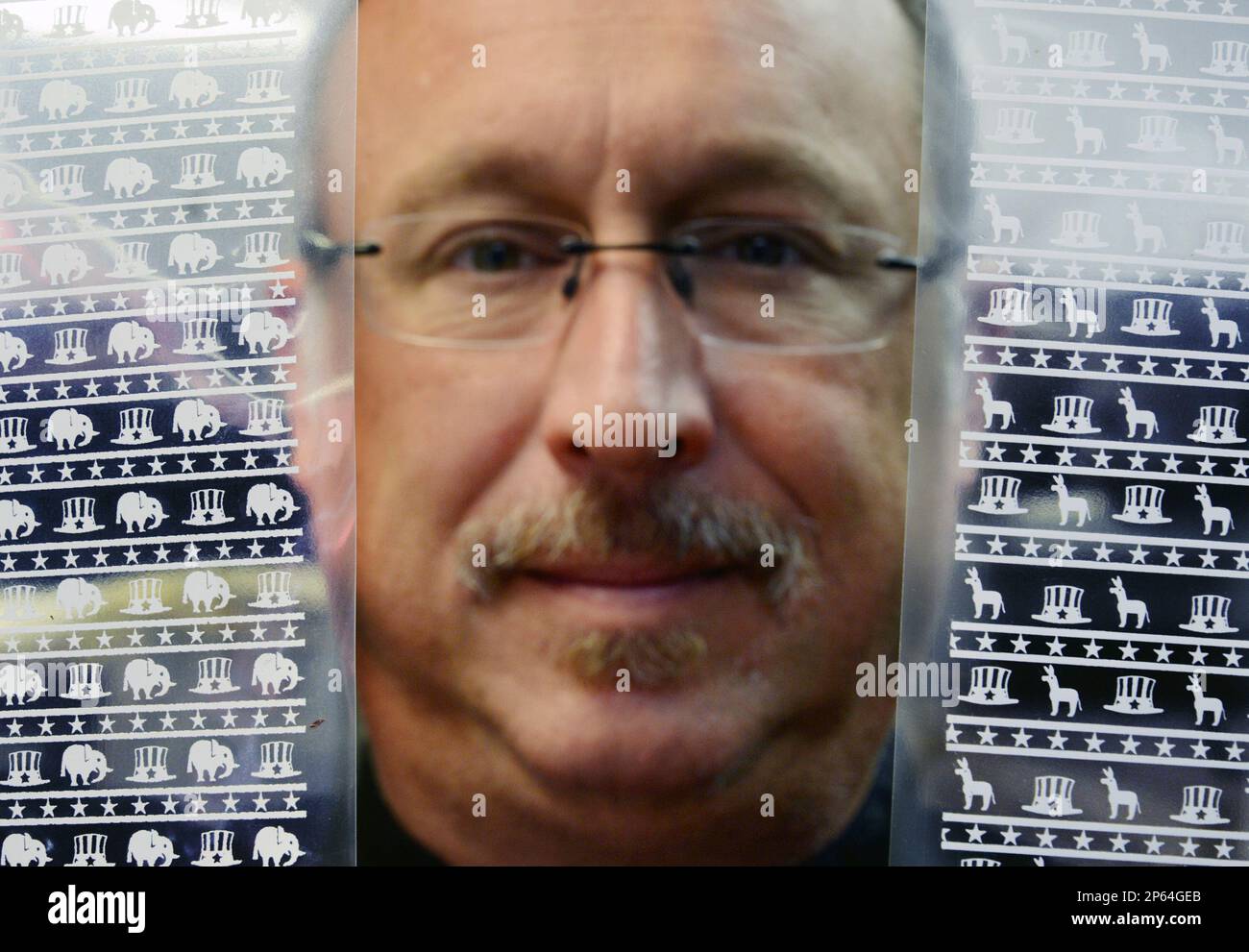 In this Sept. 21, 2012 photo, Chef Randy Olmstead holds acetate sheets ...