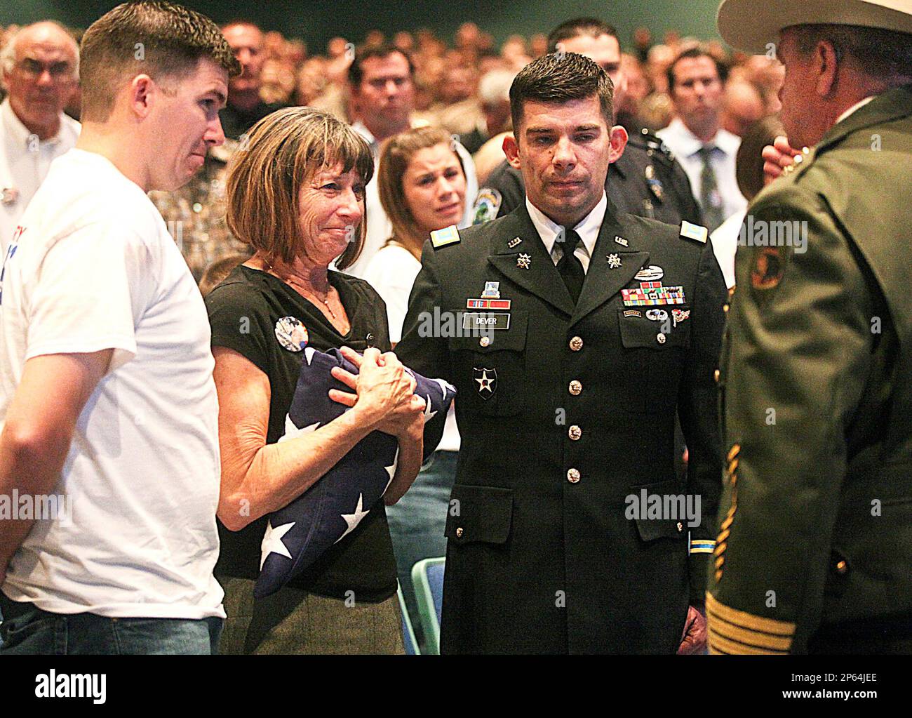 Nancy Dever, second from left, the widow of Cochise County Sheriff ...
