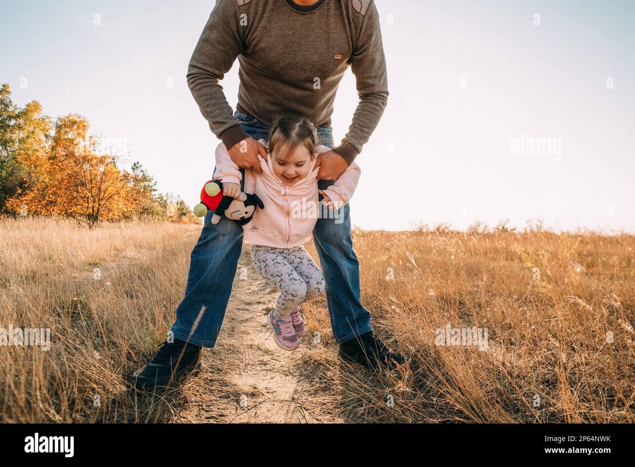 Happy Father And Child Having Fun Playing Outdoors. Smiling Young Dad ...