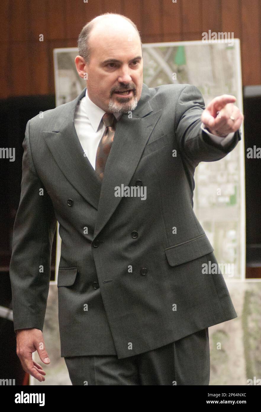 Chief Assistant Prosecutor Jeff Stroud points toward at Kenneth Bluew ...