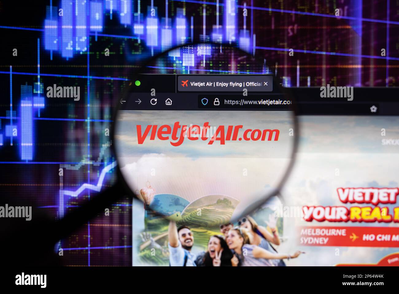 VietJet Air airline company logo on a website with blurry stock market developments in the ...