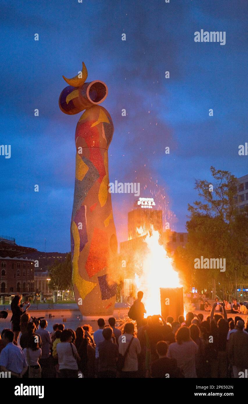 `San Joan´ Bonfire. Verbena de San Juan. In Joan Miró Park.`Dona i ...