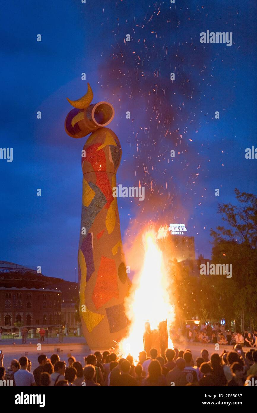 `San Joan´ Bonfire. Verbena de San Juan. In Joan Miró Park.`Dona i ...