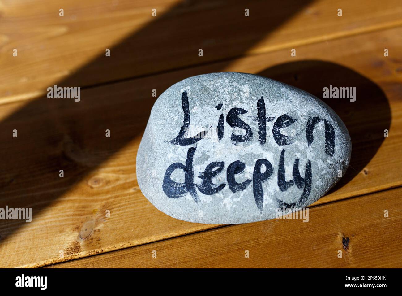 Painted rock with words of encouragement. Listen deeply, painted on a ...