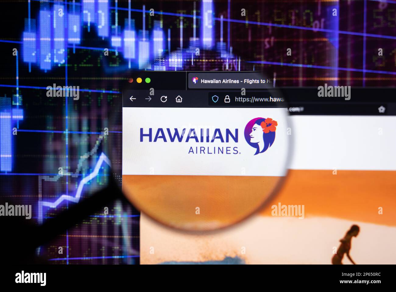 Hawaiian Airlines company logo on a website with blurry stock market developments in the ...