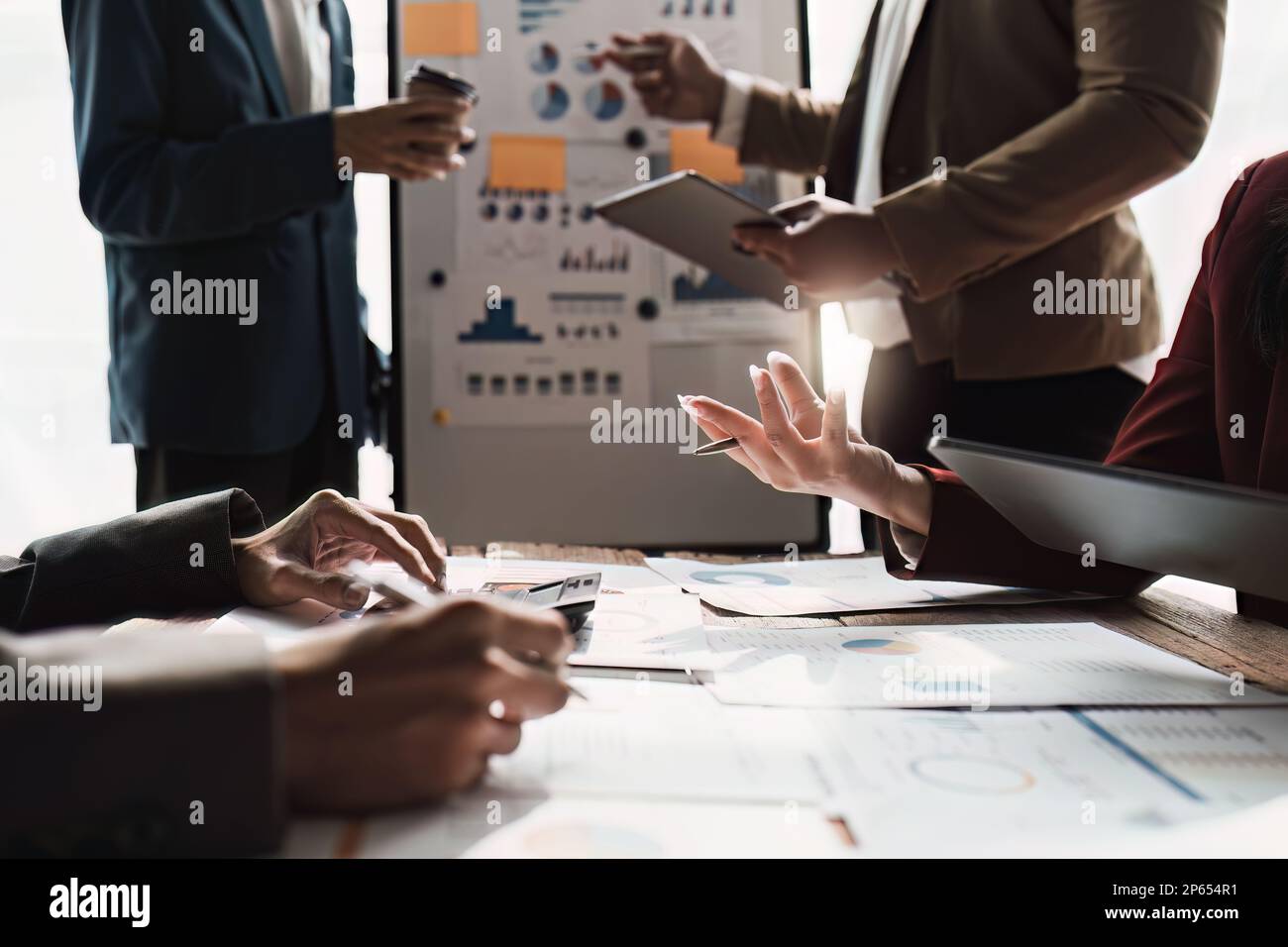 Business people financial discuss and analysis plan of market strategy ...