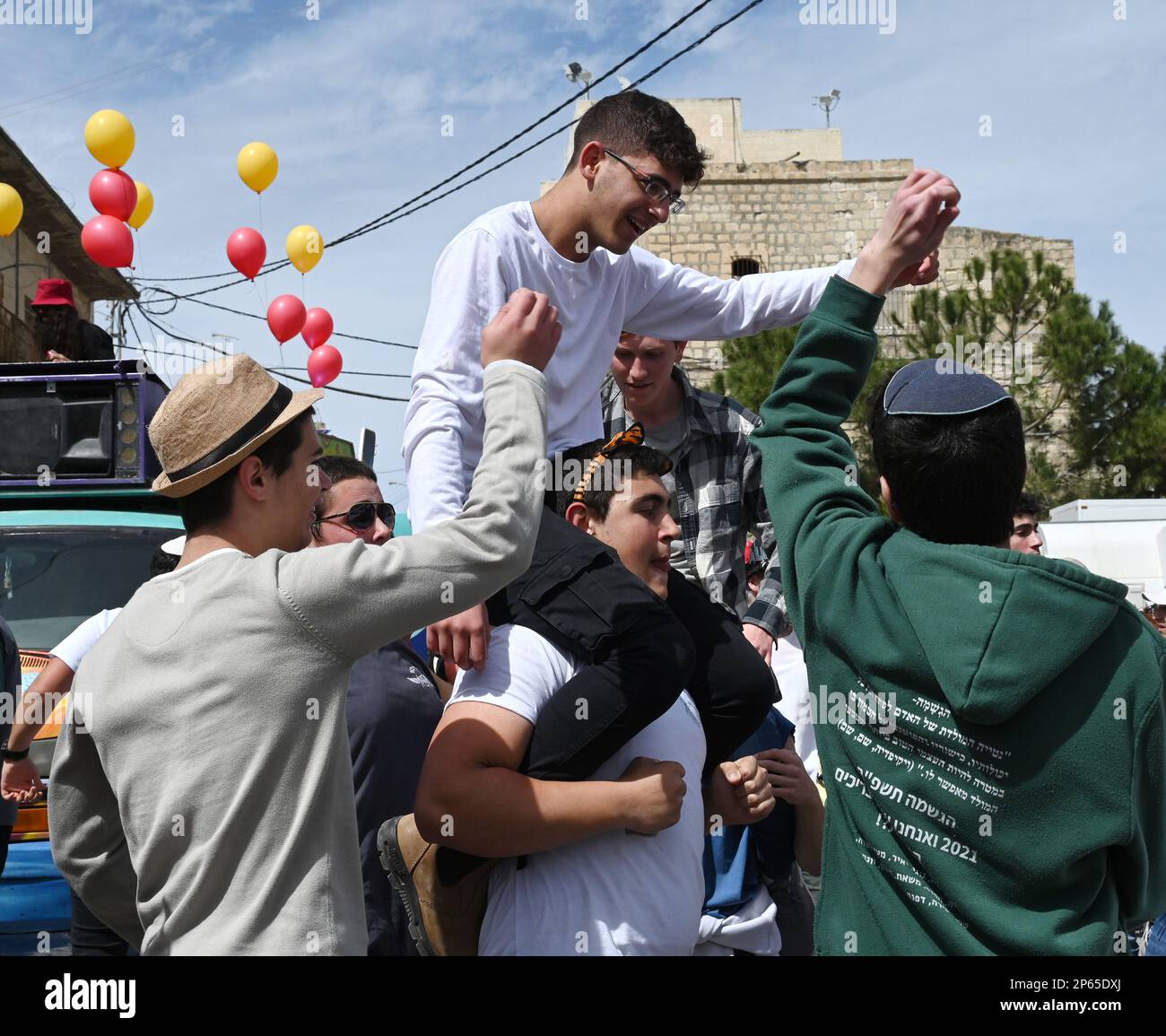Hebron, West Bank. 07th Mar, 2023. Israeli settlers dance during the ...