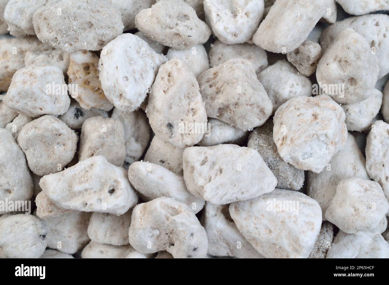 Porous white volcanic rock isolated on white background. Lava stone ...