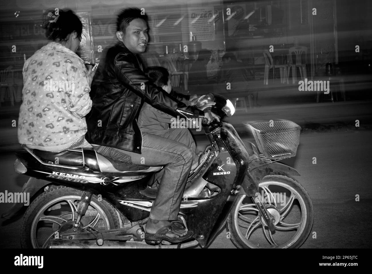 Man on motorcycle woman Black and White Stock Photos & Images - Alamy