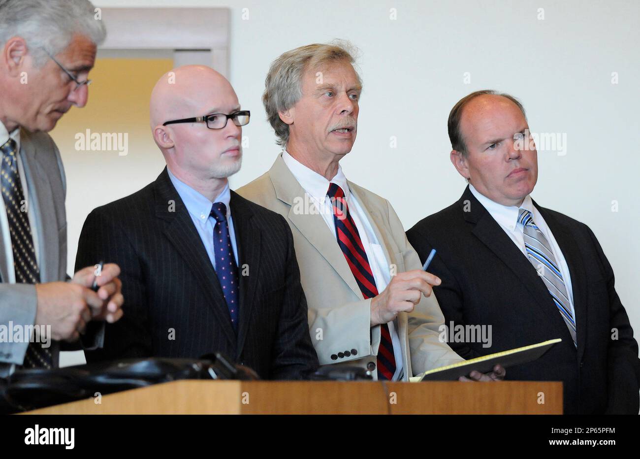 Lawrence Deputy Police Chief Melix Bonilla, second from left, and Mayor ...