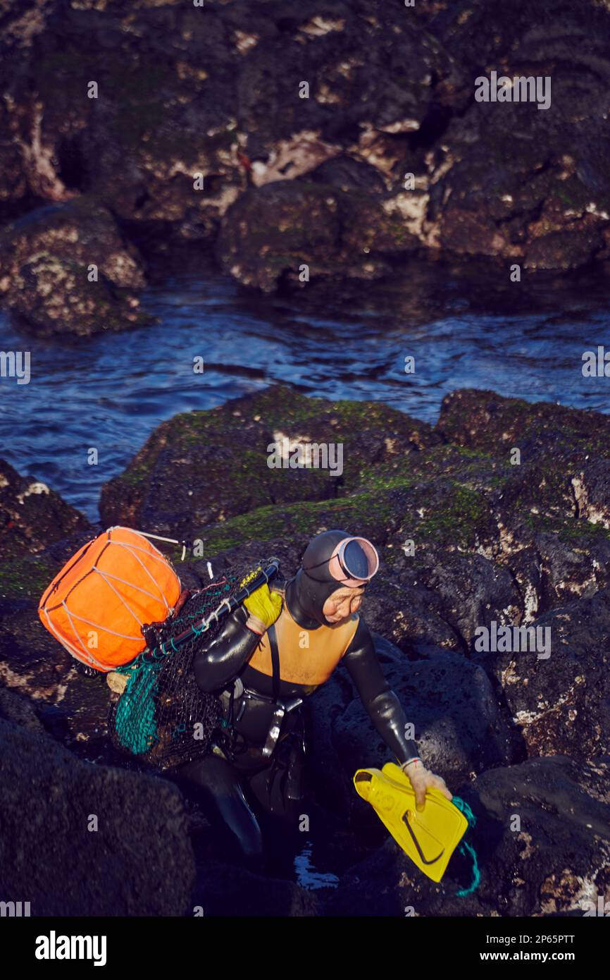 Haenyeo, the female divers in the Jeju island, South Korea Stock Photo ...