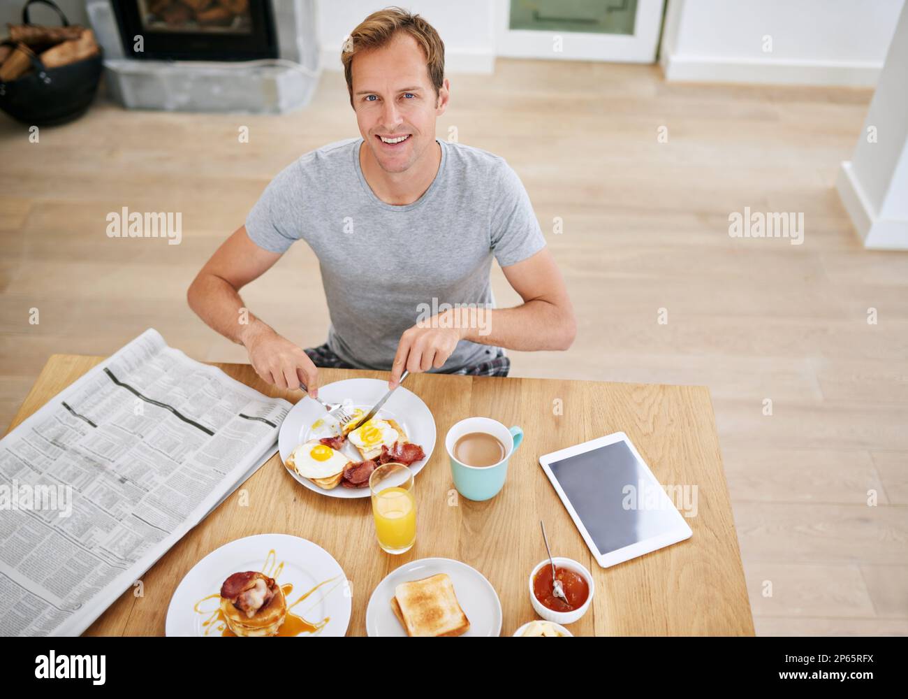 The best way to start a day. High angle portrait of a handsome man ...