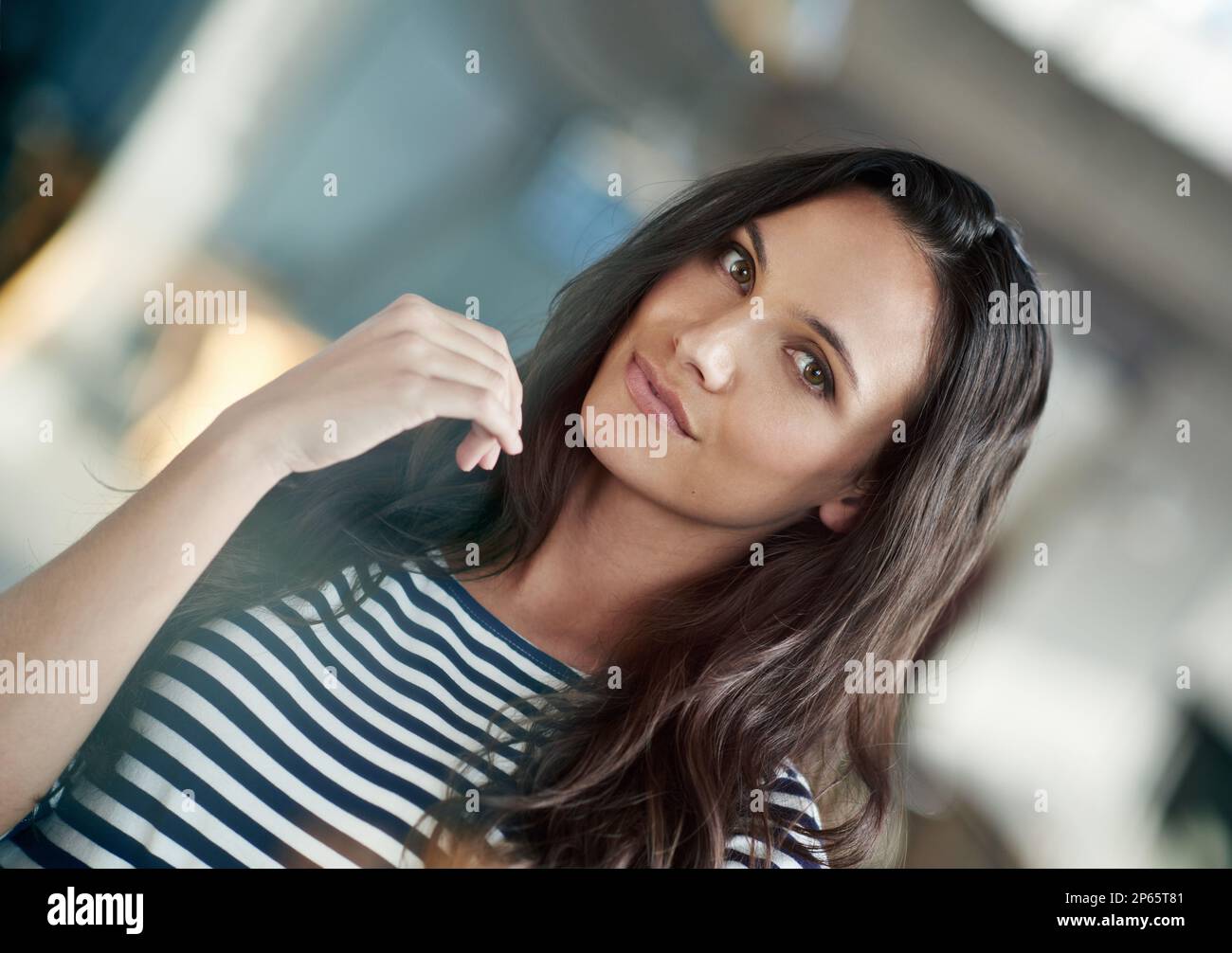 Shes the model employee. a casually-dressed businesswoman standing in ...