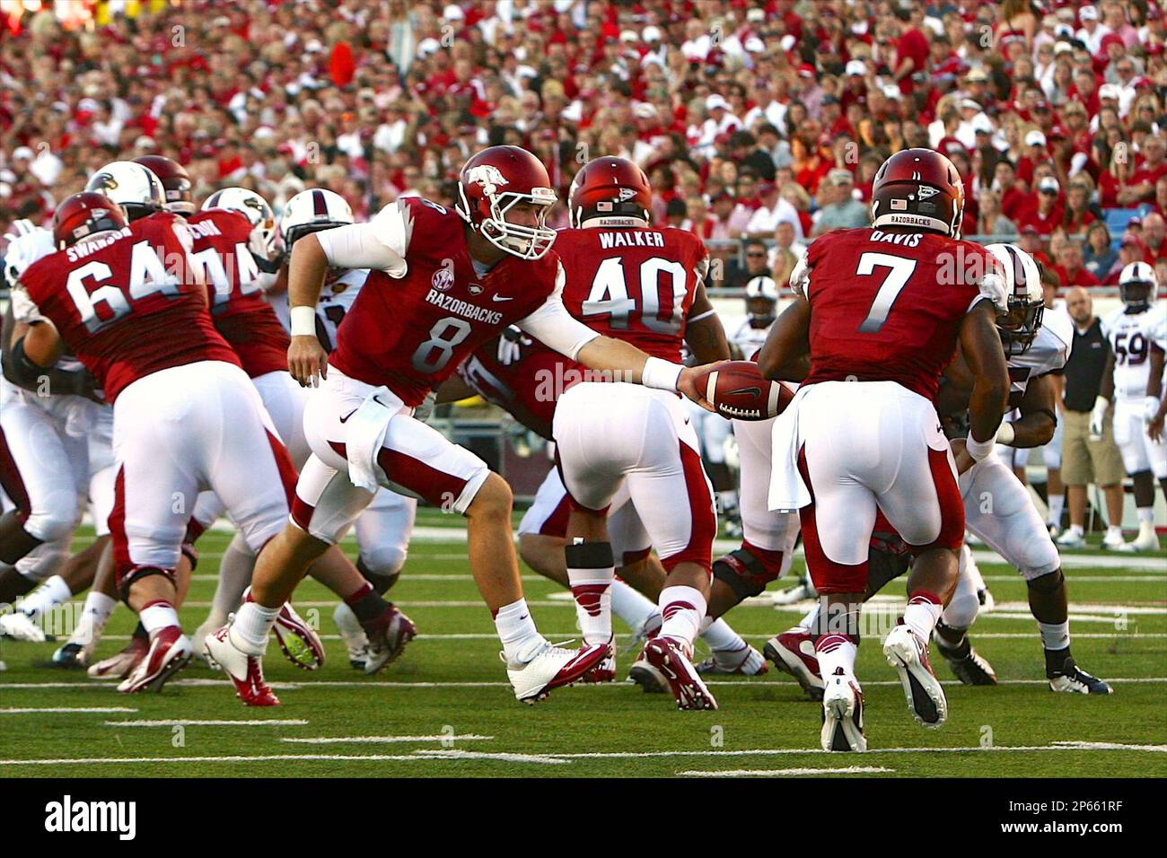 Sep 8, 2012: Razorback QB Tyler Wilson #8 stretches to put the ball ...