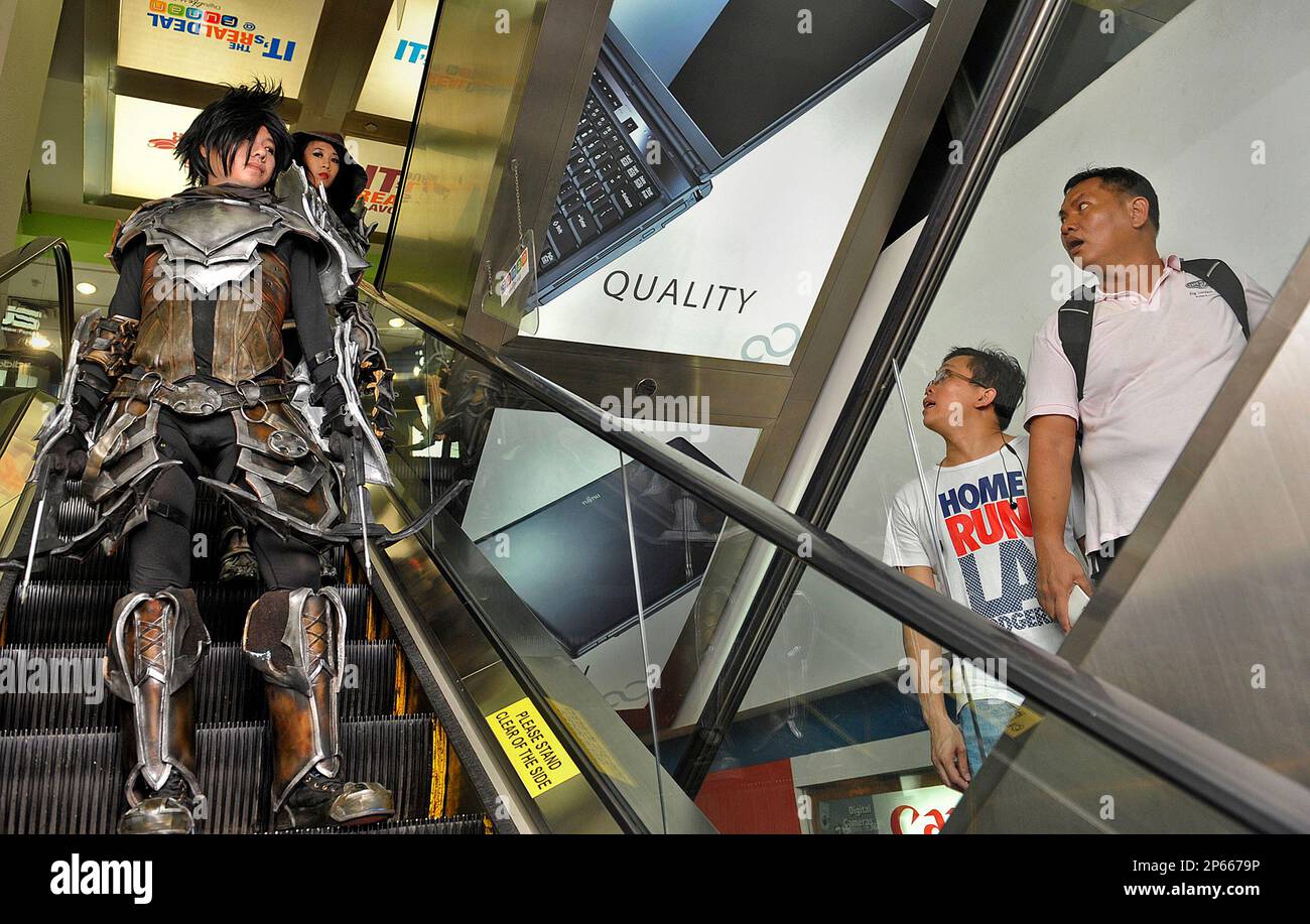 Fans of the role-playing computer game Diablo (from left) Jason Koh, 30 ...